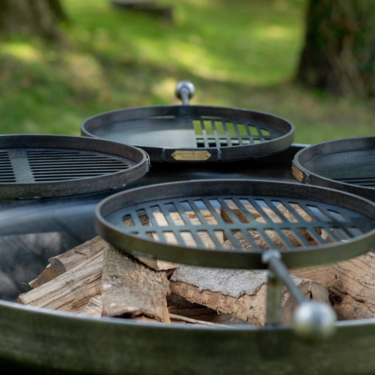 Ring of logs 120 with four swing arm BBQ racks – Urban Grow UK Ltd